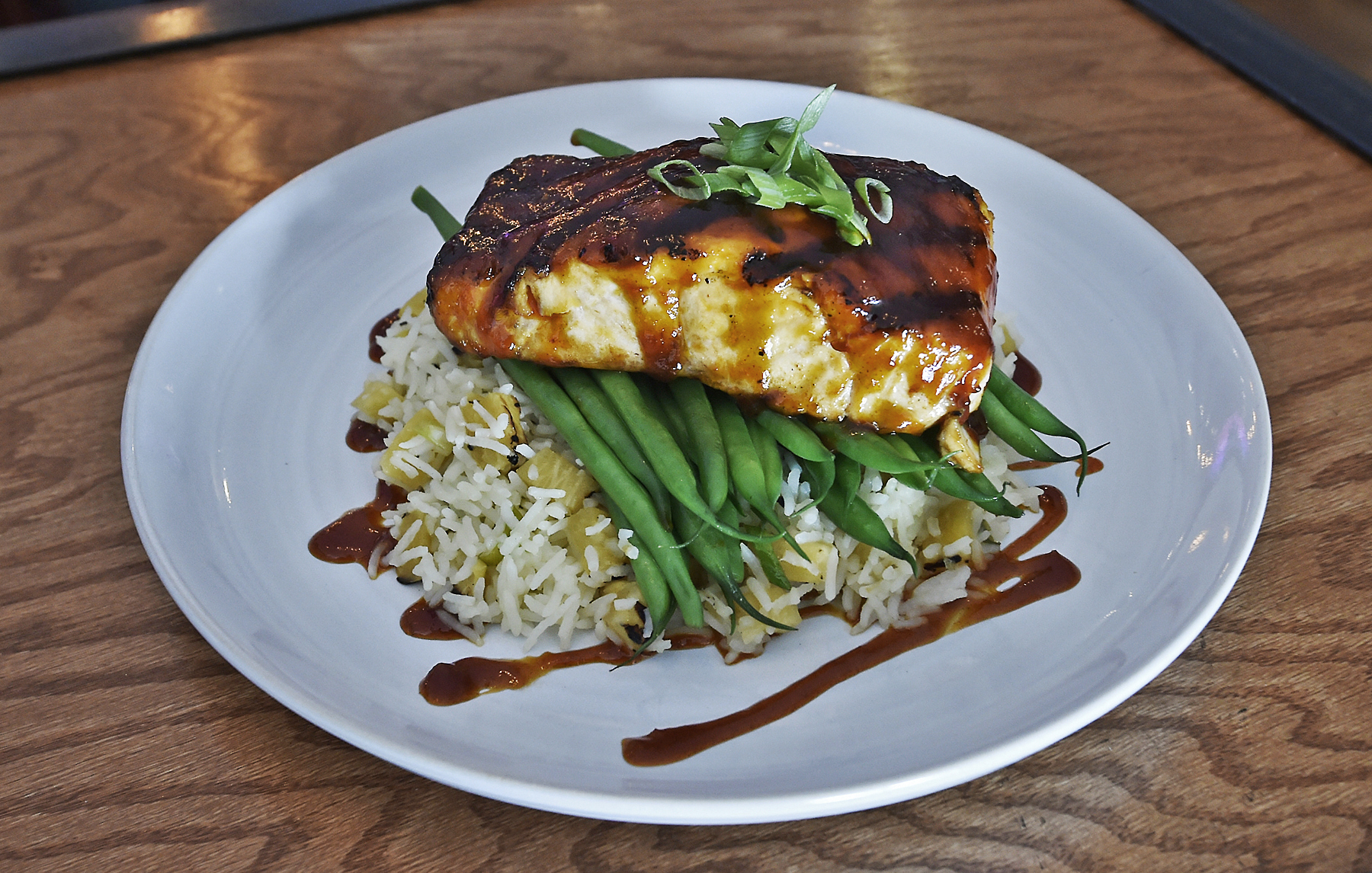 A popular entree at Dorcea is the korean salmon. Photograph by Butch ...